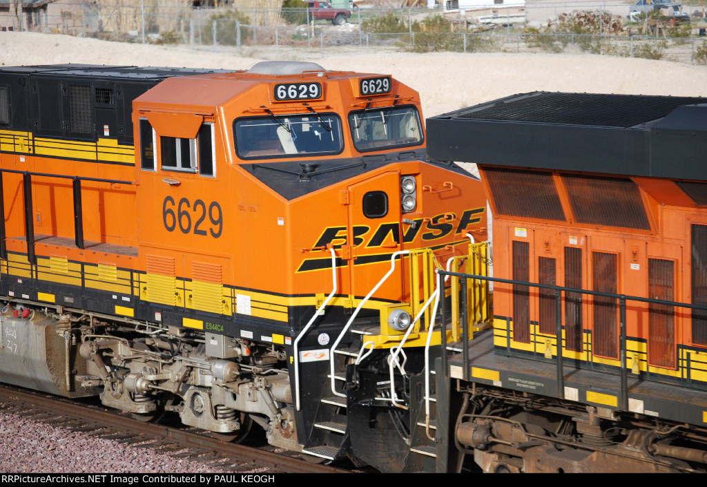 BNSF 6629 close up shot of the cab as she rolls eastbound.